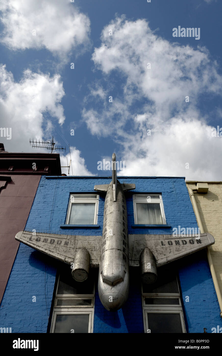 Airplane logo on shop in Camden Town, London Stock Photo - Alamy