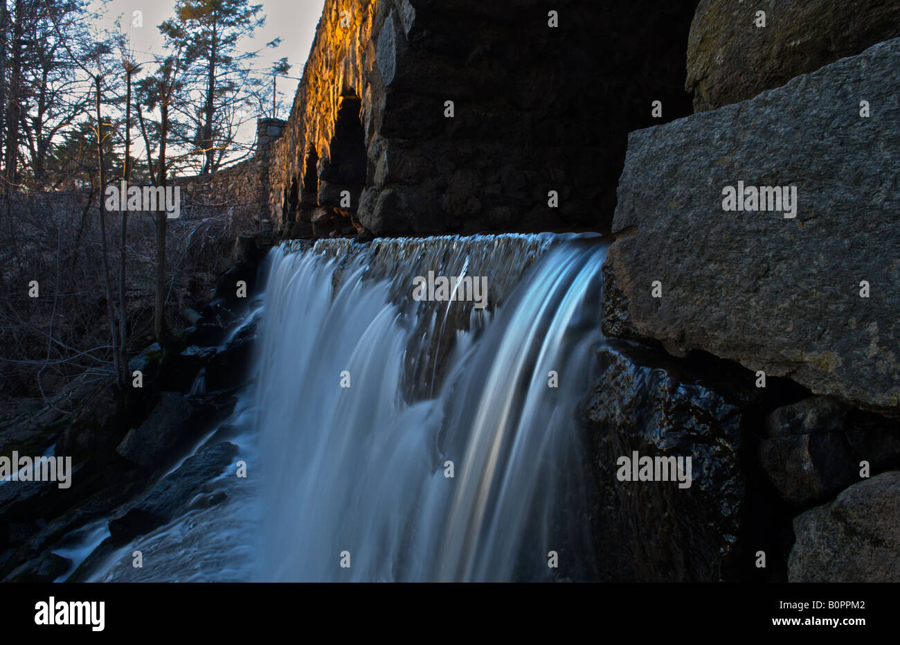 water from the rocks slowly moves down Stock Photo - Alamy
