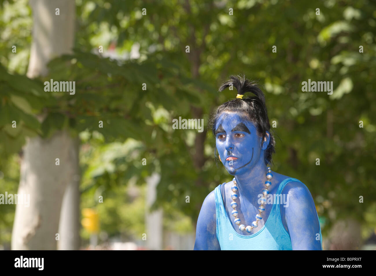 Woman in blue Stock Photo - Alamy