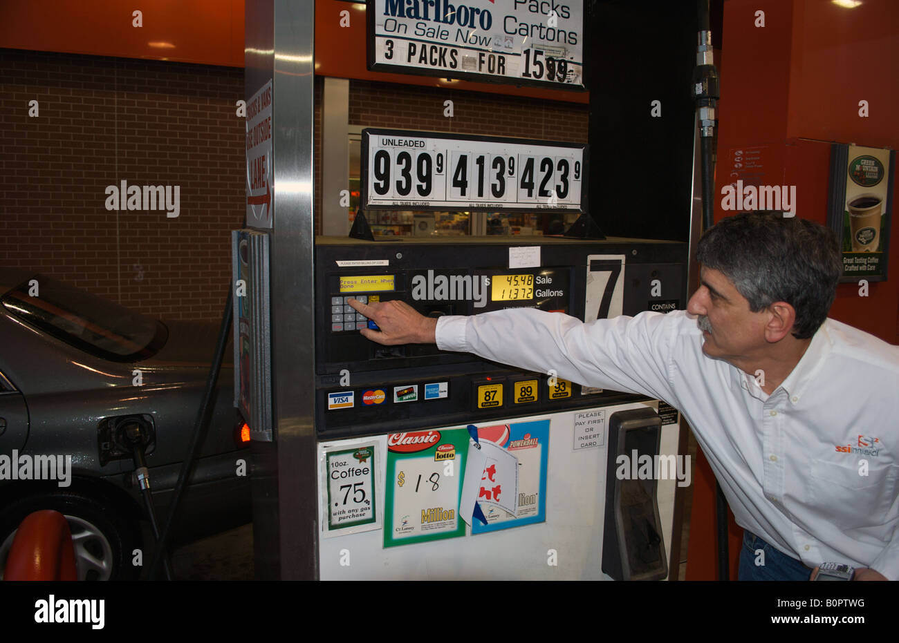 paying for fuel Stock Photo - Alamy