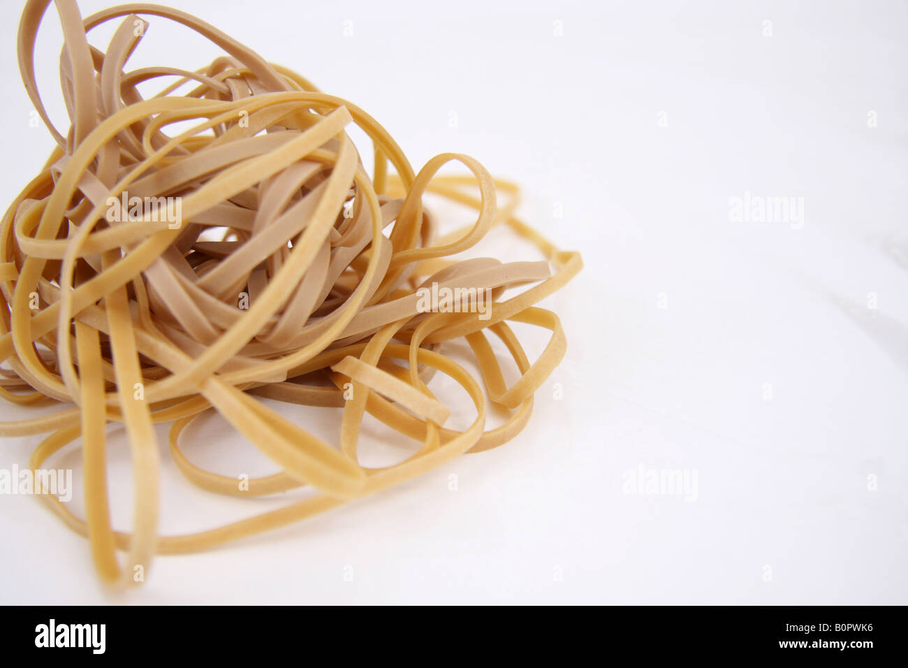 pile of twisted elastic bands Stock Photo - Alamy