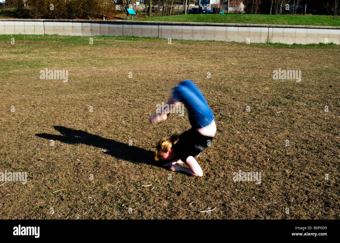 young woman doing gymnastics outdoors Stock Photo - Alamy