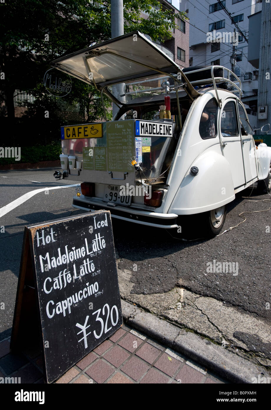 Small cafe set up in the back of a Citroen 2CV in trendy neighbourhood ...