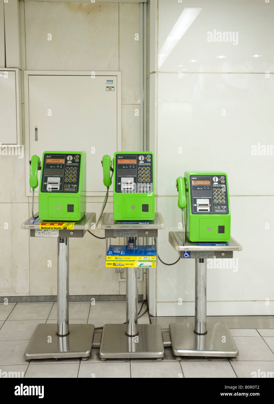 Three public telephones inside a subway station in Tokyo Japan Stock ...