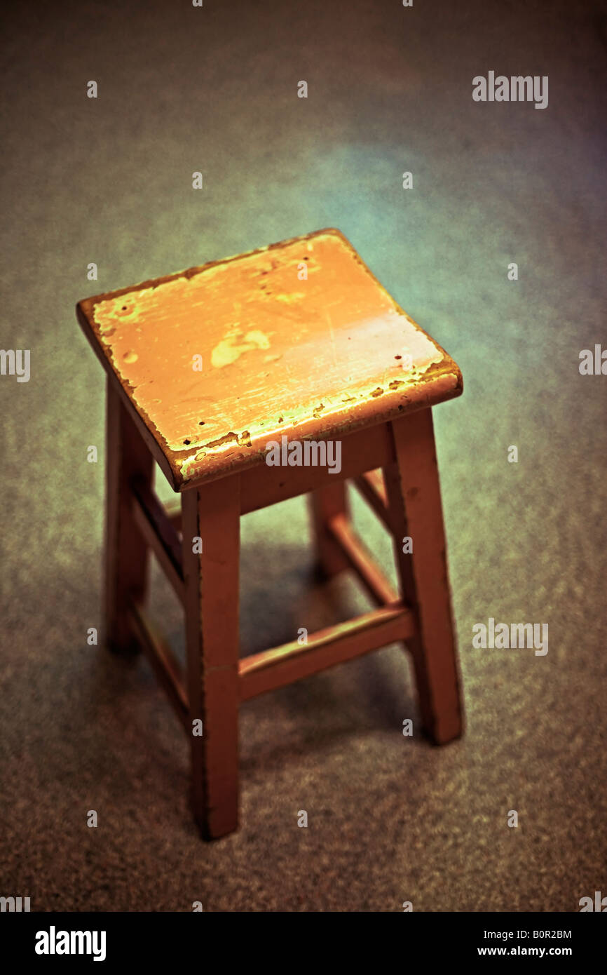 Pink stool wooden old chipped paint Stock Photo - Alamy