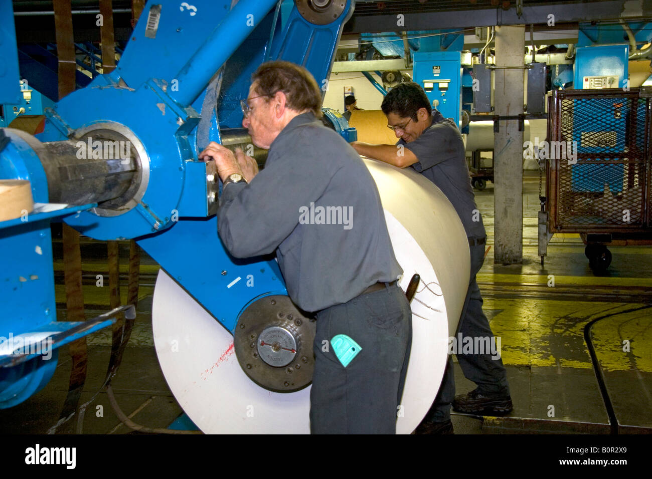 Paper roll in a printing press hi-res stock photography and images - Alamy