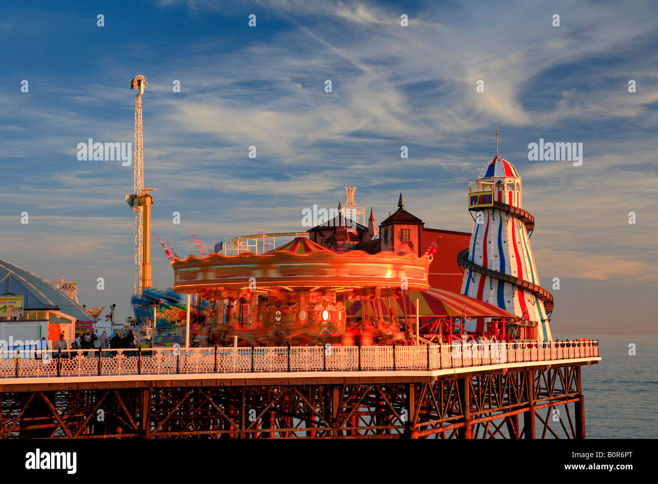 Sunset over the Funfair Palace Pier Brighton Sussex England Britain UK ...