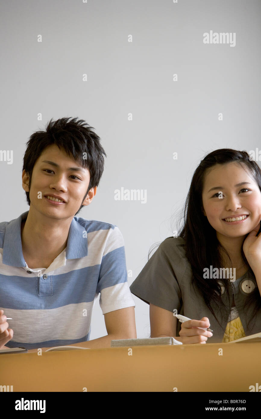 Two students talking Stock Photo - Alamy