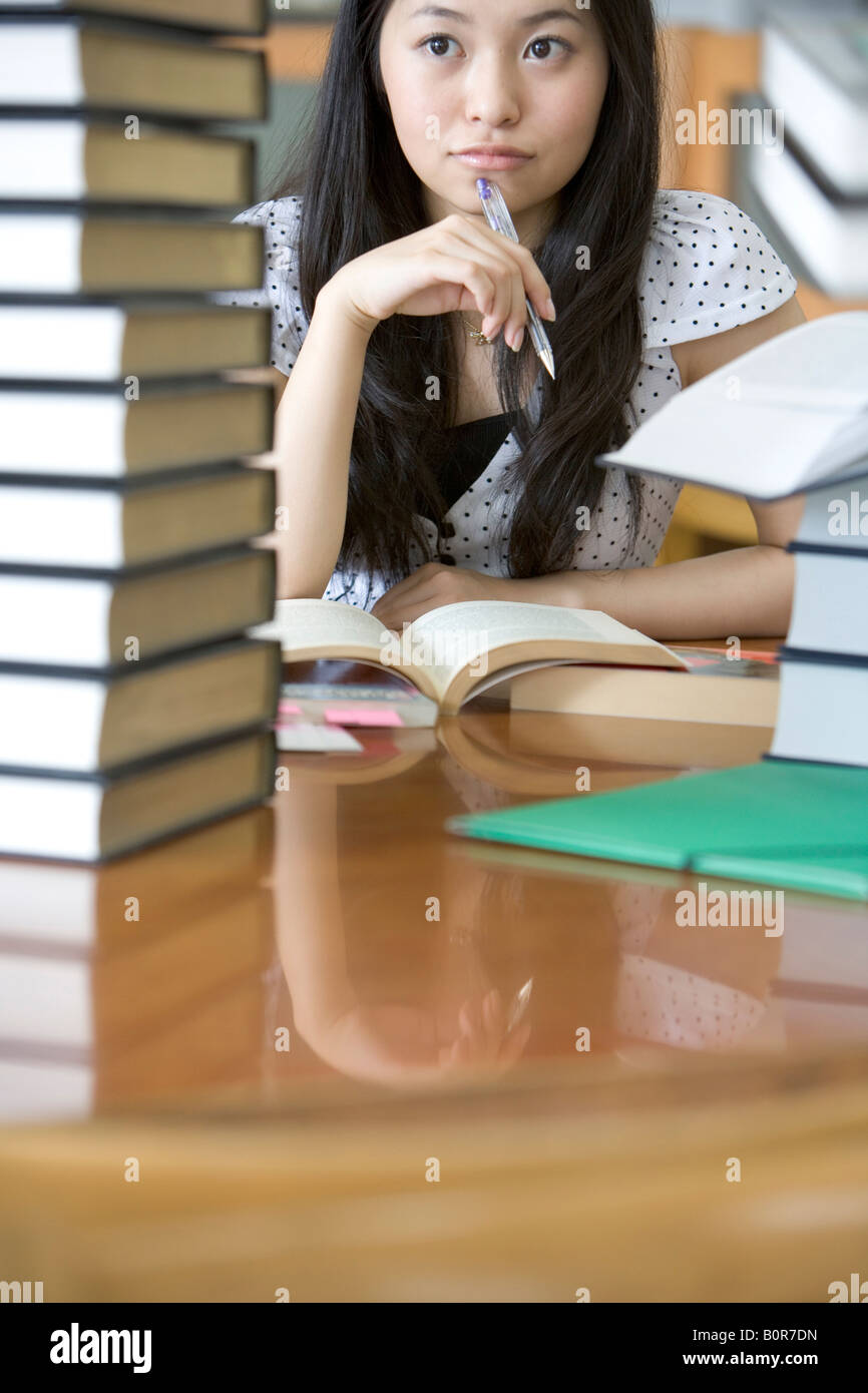 Young woman learning Stock Photo - Alamy