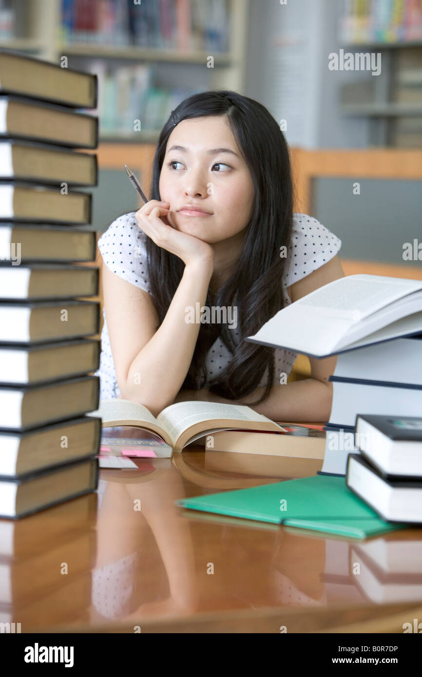Sitting book stack learning education reading concentration hi-res ...