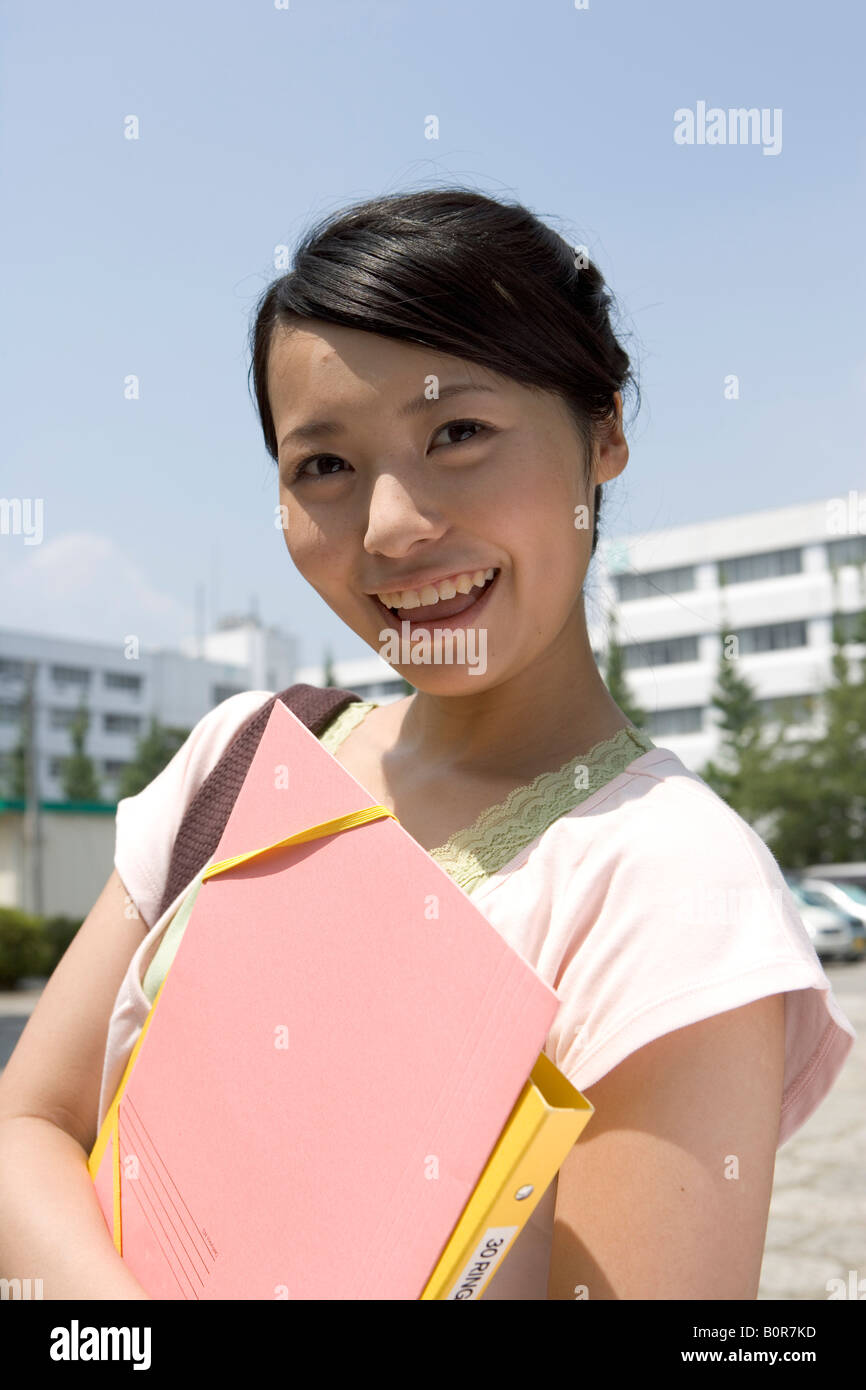 Portrait of female student Stock Photo - Alamy
