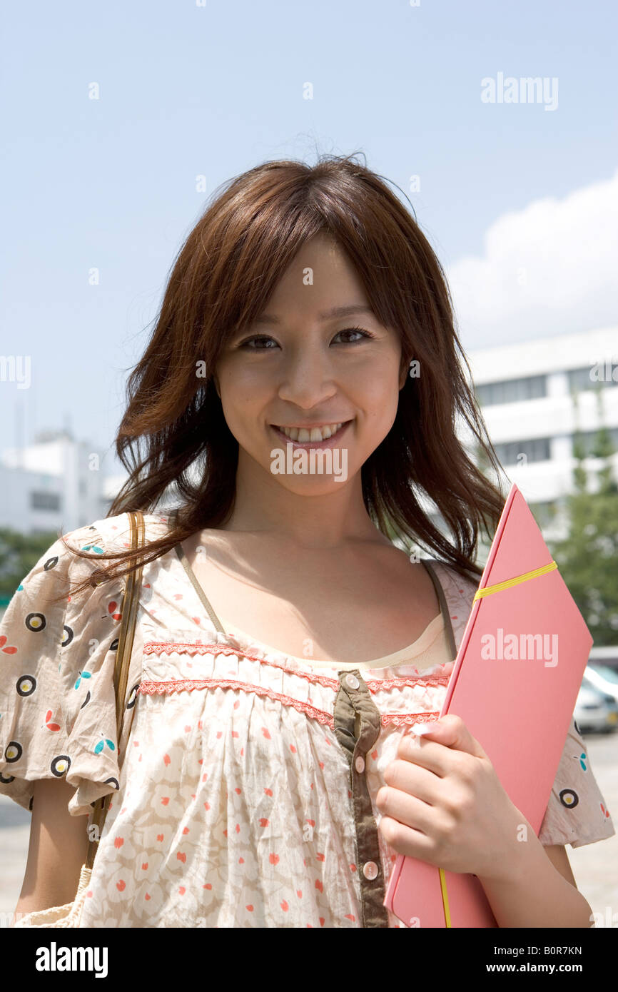 Portrait of female student Stock Photo - Alamy
