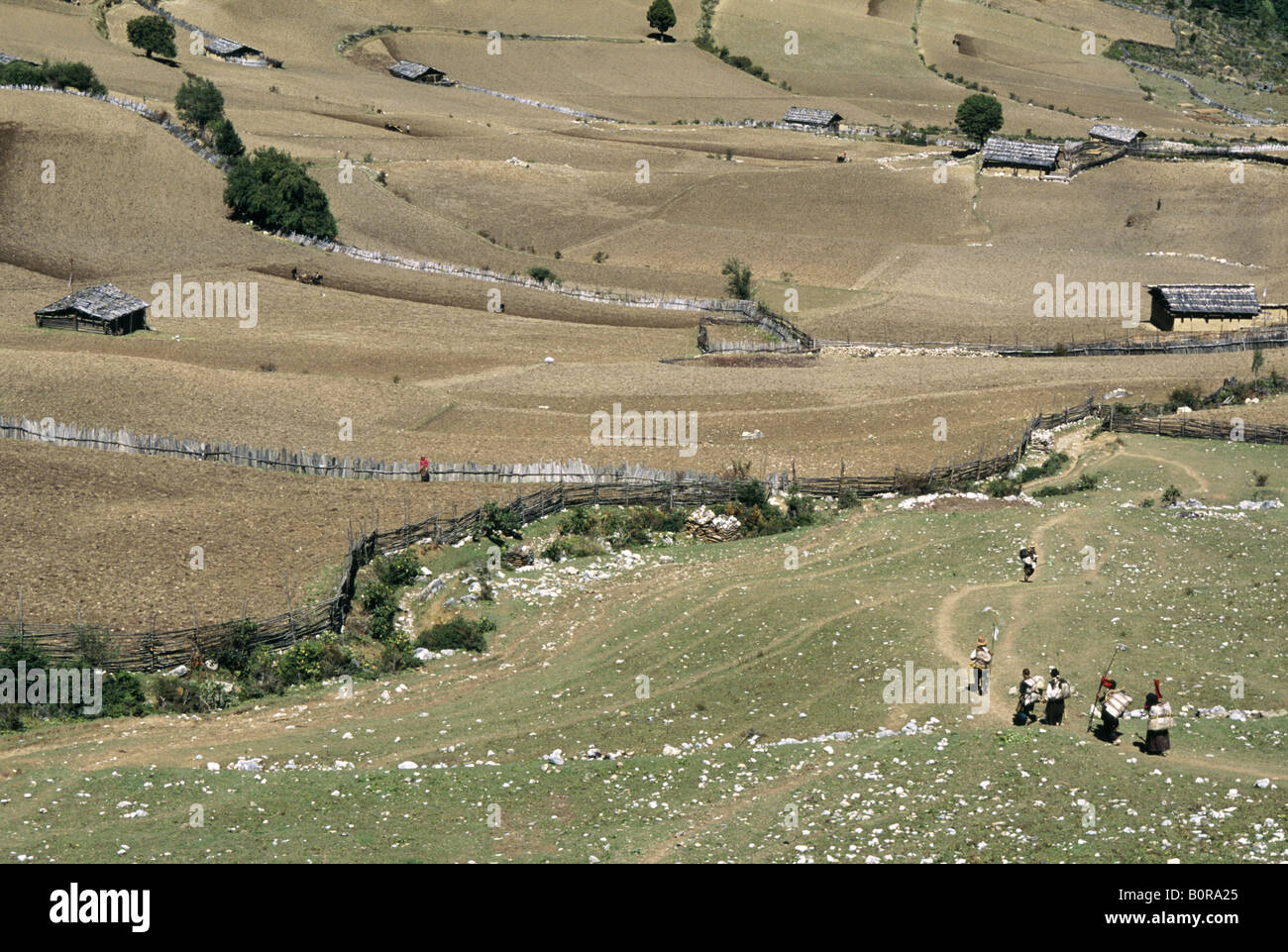 Eastern Tibet View across landscape Farm buildings Small fields Bare ...