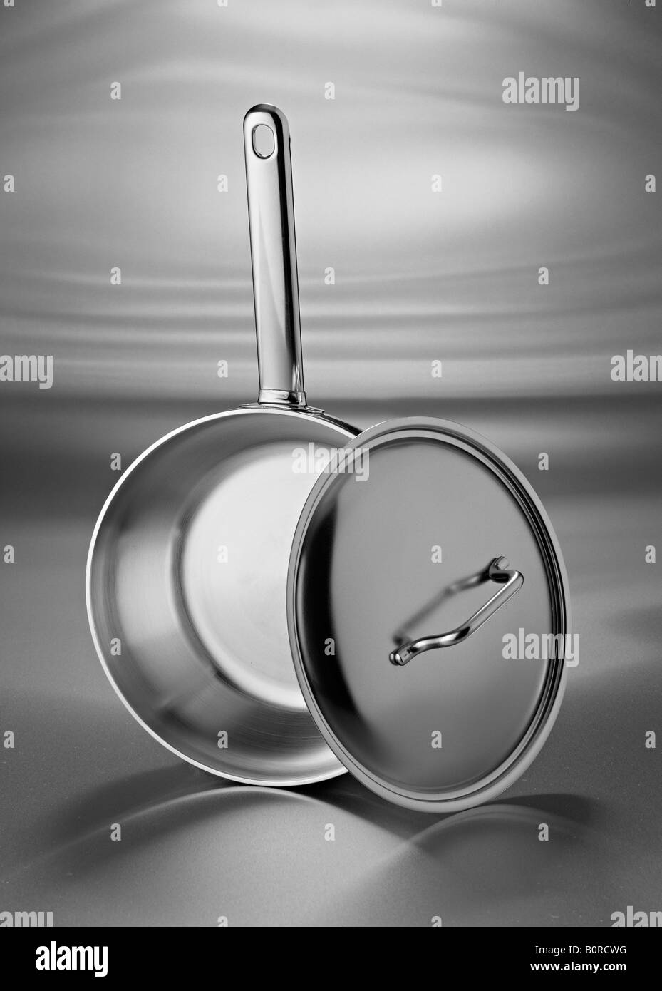 Stainless steel cooking pots Black and White Stock Photos & Images - Alamy