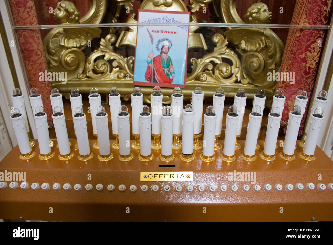 electrical candles at an Italian catholic christian church in front of ...