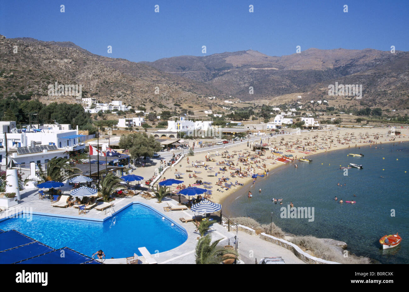 Hotel swimming pool at Milopotas Beach, Ios Island, Cyclades, Greece ...