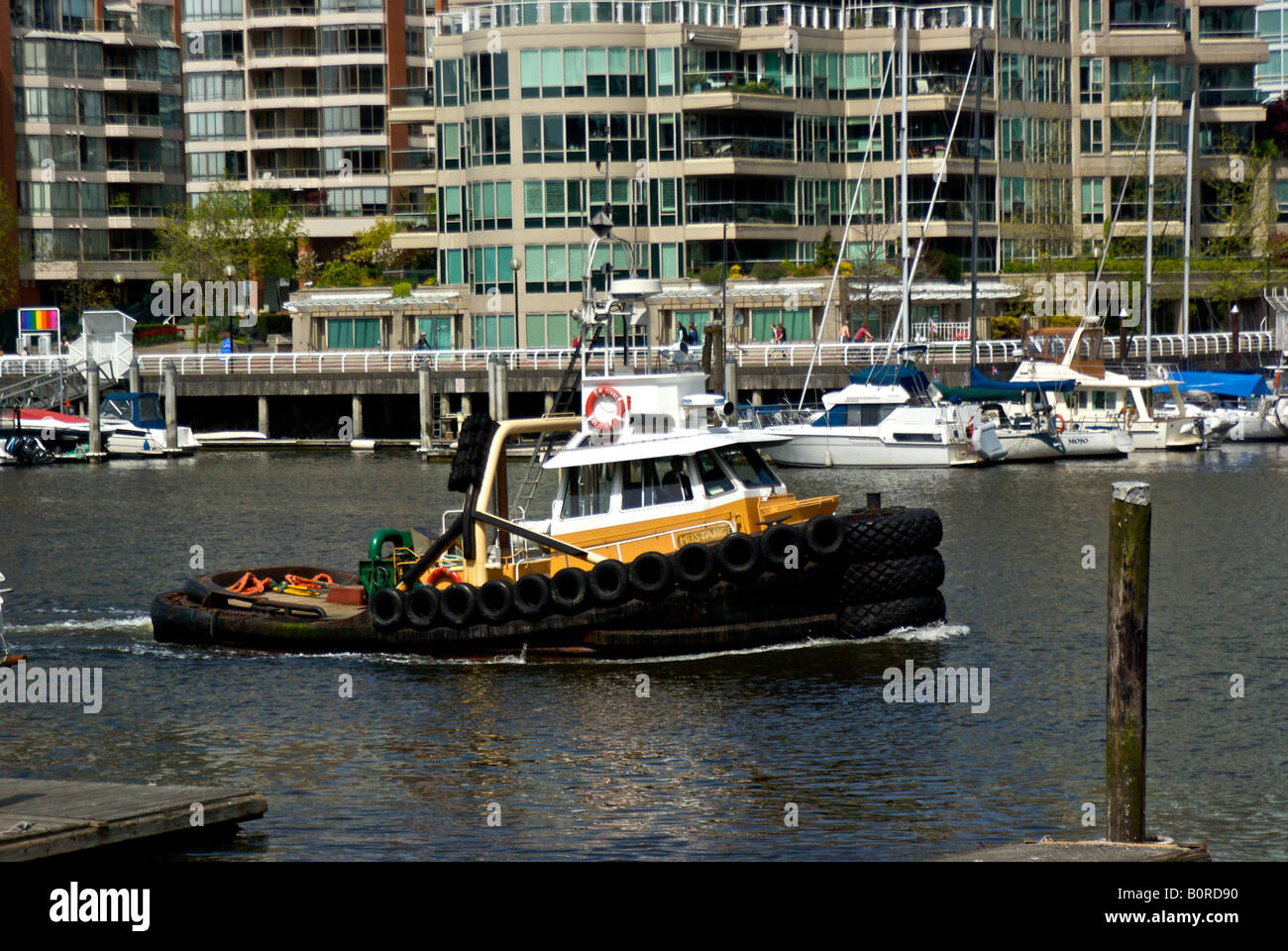 Tugboat working in Vancouver's False Creek Stock Photo - Alamy