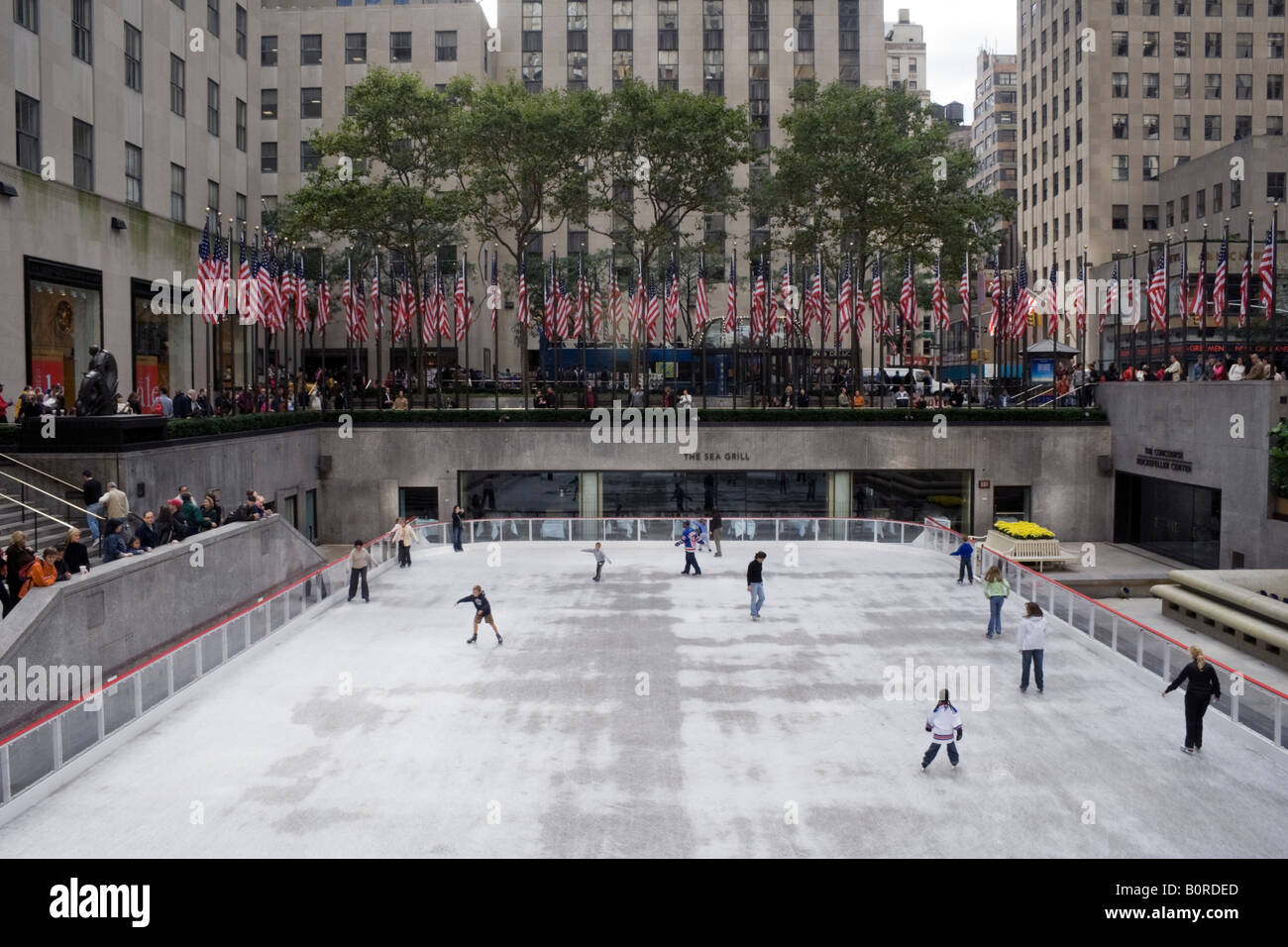 A temporary ice skating rink in Rockefeller Plaza New York City Stock ...