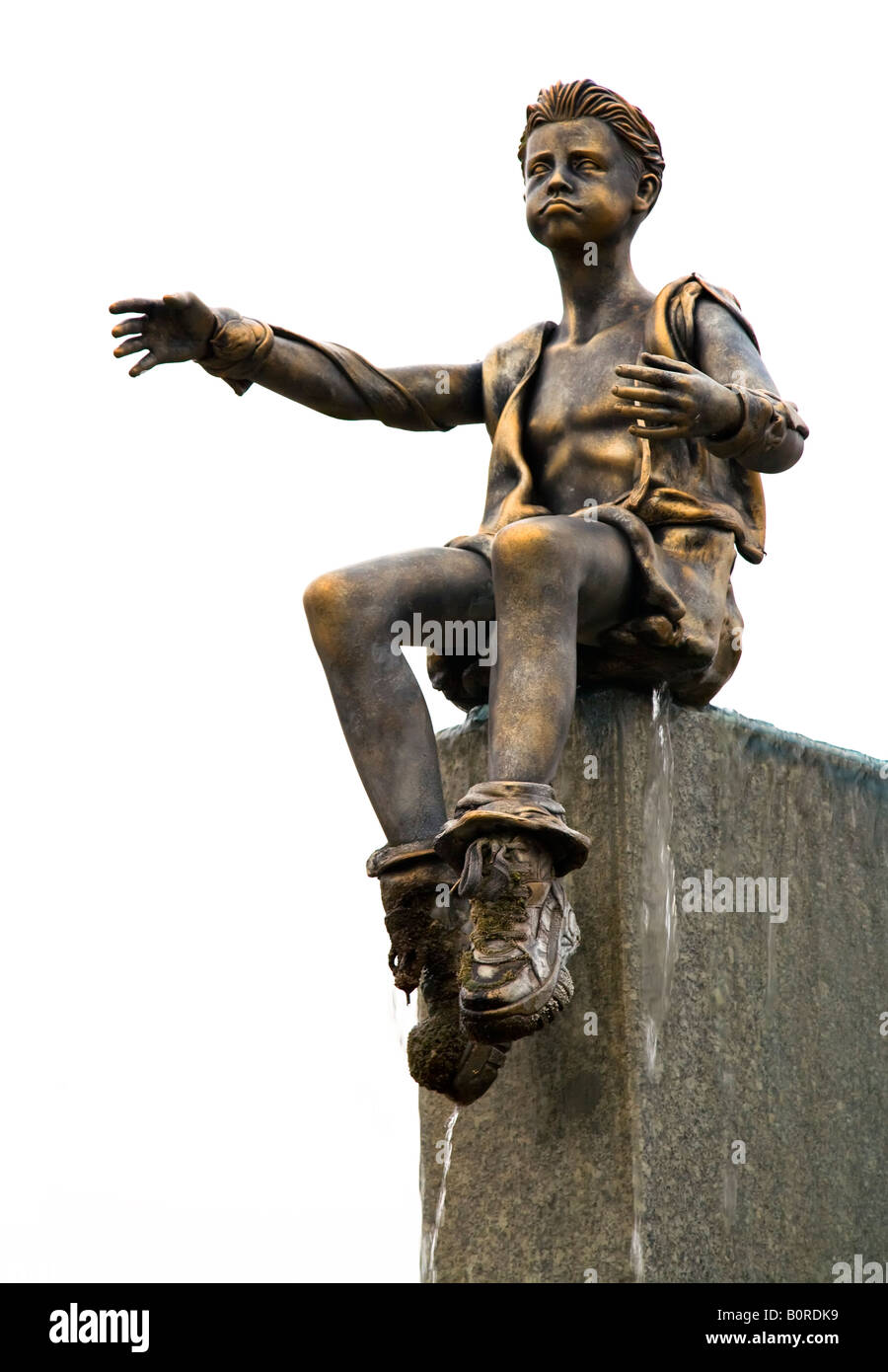 Bronze statue of grumpy boy with outstretched arms Belgium Stock Photo ...