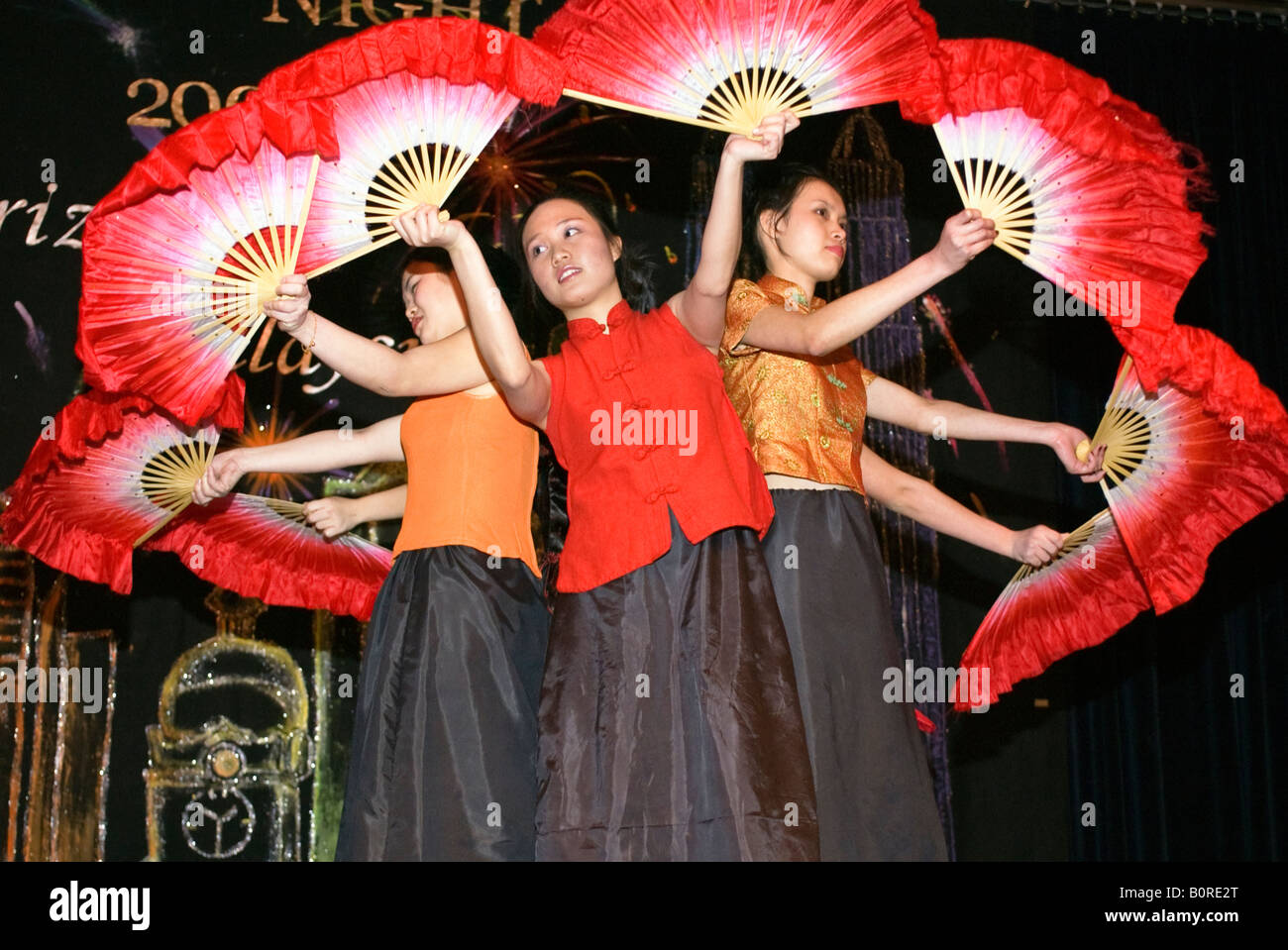 Fan dancers at Malaysia Night Stock Photo - Alamy