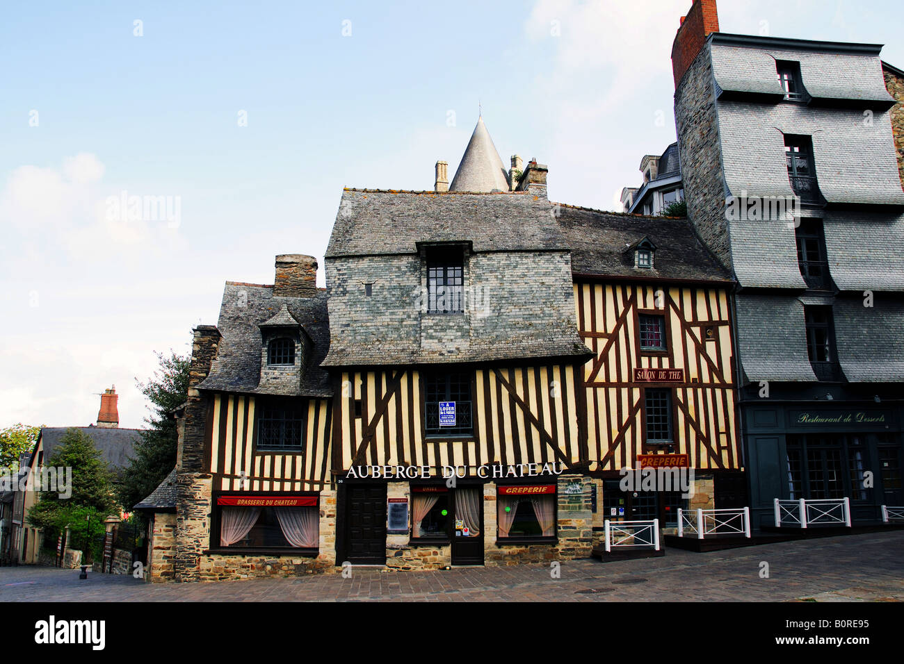 The towers of the Medieval Chateau and houses in the town of Vitre ...