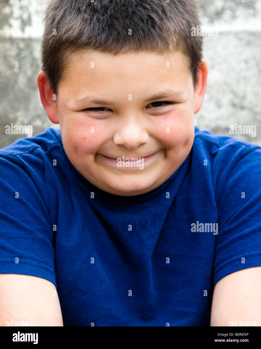 Nervous smile on little boy Stock Photo - Alamy