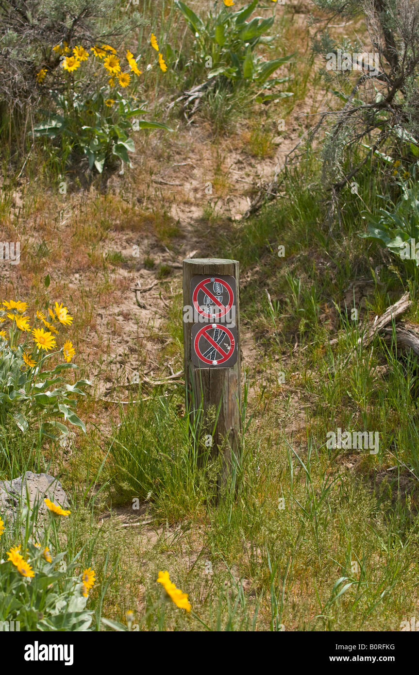 Idaho, near Boise. A sign in the foothills tells people to stay on ...