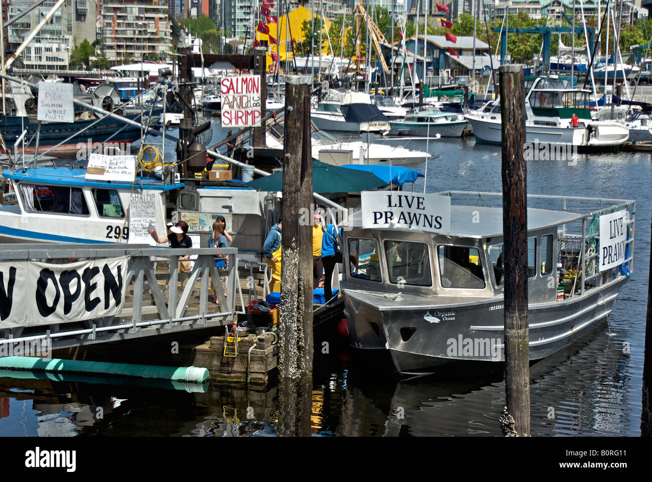 Commercial fish dock in False Creek that is open to the public for fish ...