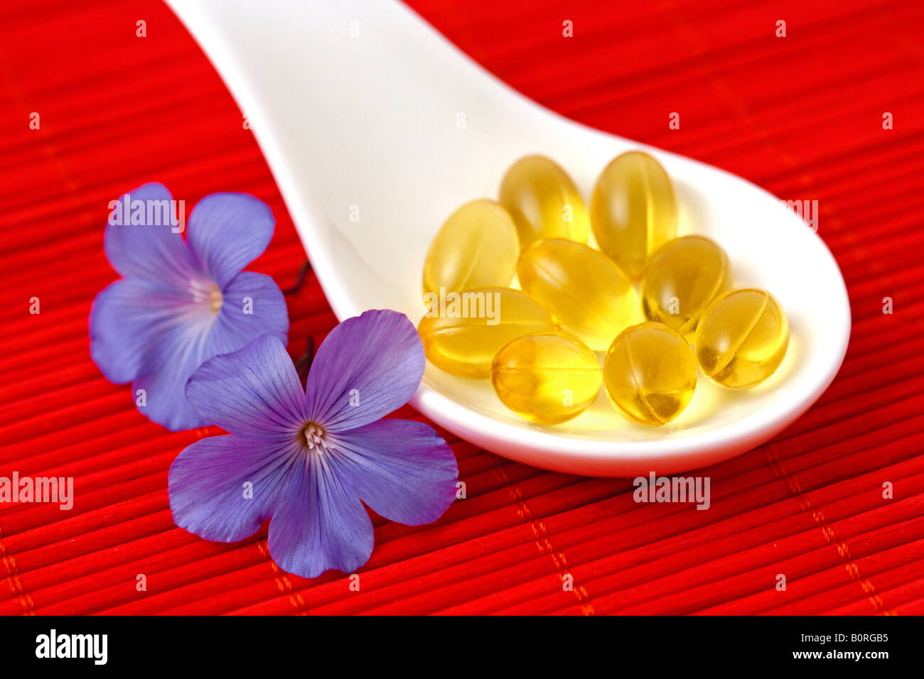 Linseed oil capsules Stock Photo - Alamy