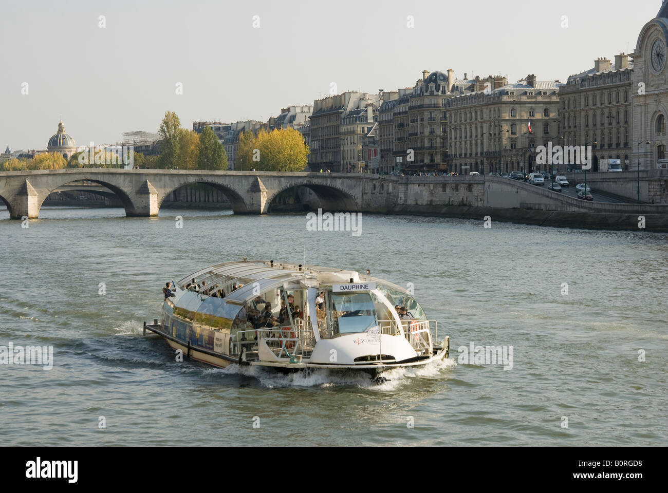 The Batobus shuttle boat cruises the River Seine in Paris France Stock ...
