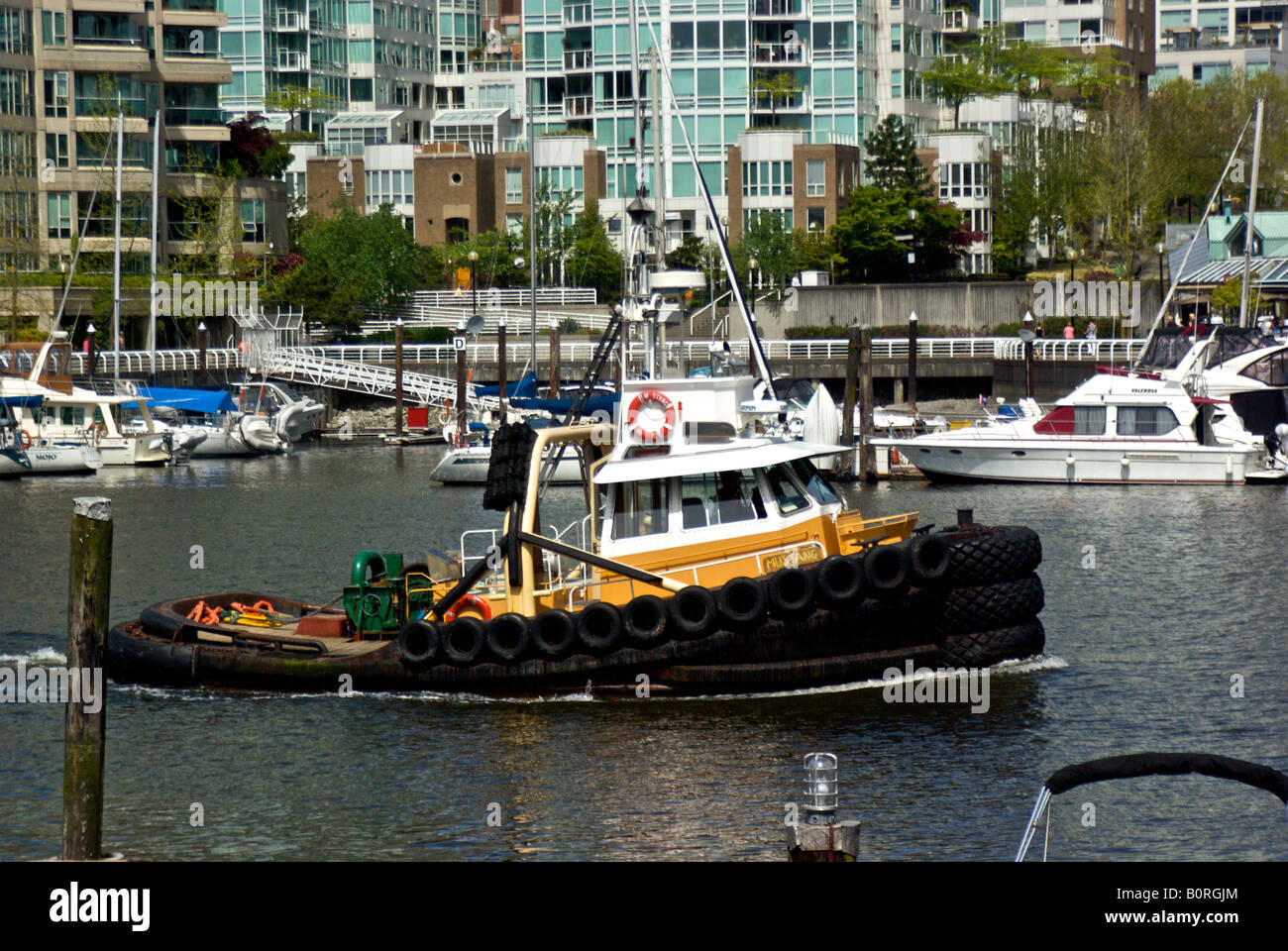 Tugboat working in Vancouver's False Creek Stock Photo - Alamy
