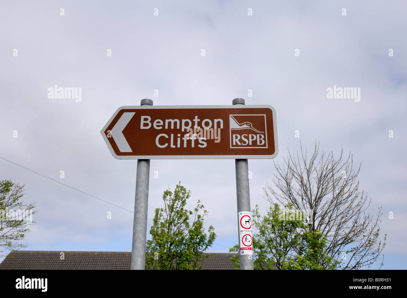 Directional road sign for RSPB reserve Bempton Cliffs located on Cliff ...