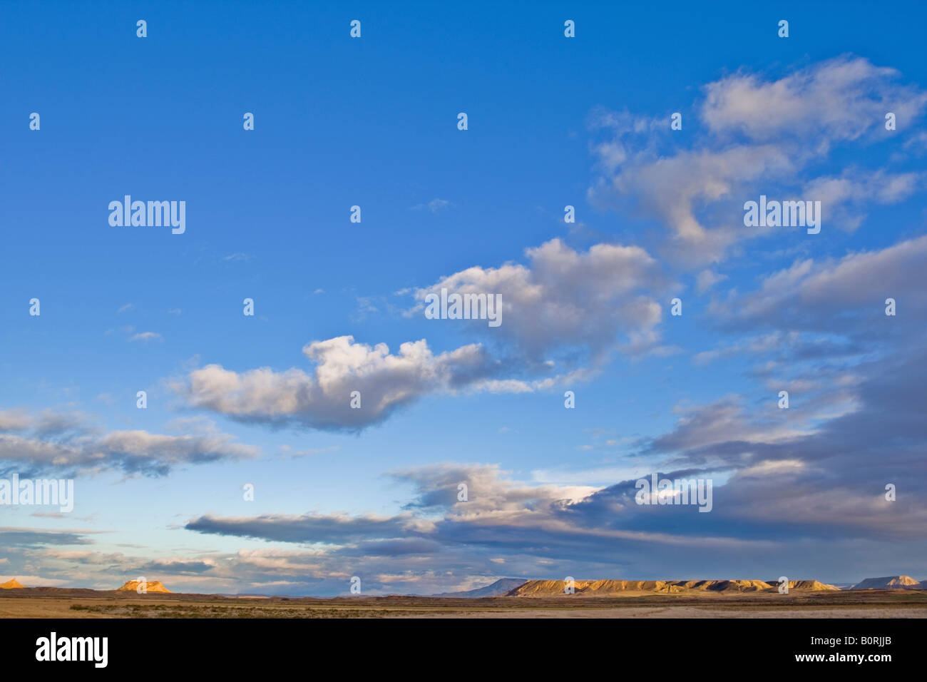 Hills under the cloudy sky in spring season Stock Photo - Alamy