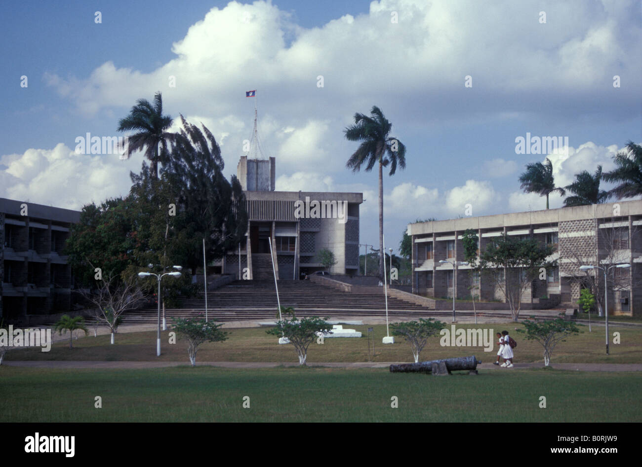 Schoolgirls walking past the Belizian government buildings on ...