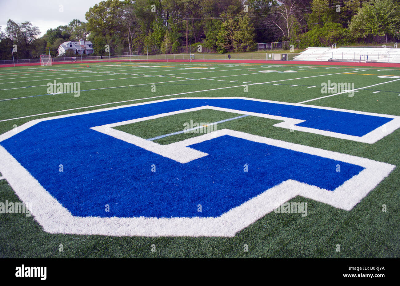 Middle of the football field 50 yard line Stock Photo - Alamy