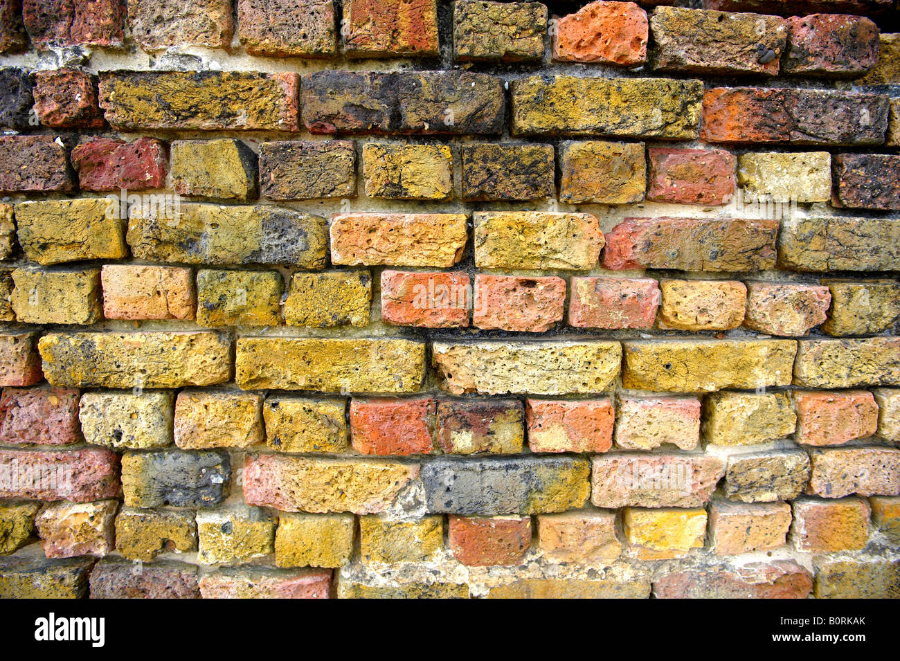 Multi coloured brick wall Stock Photo - Alamy