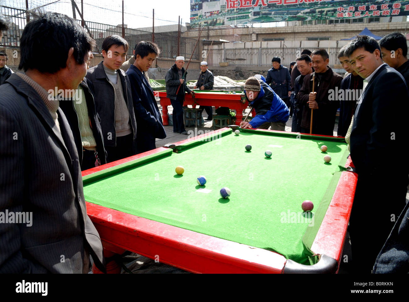 Man play Pool in Xinging,Quinghai Province ,China Stock Photo - Alamy