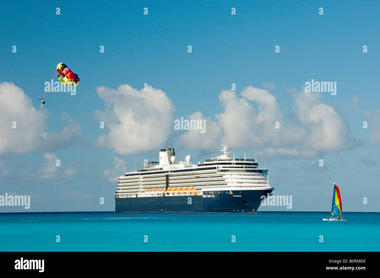 Parasailing with the Holland America cruise ship Westerdam anchored off ...