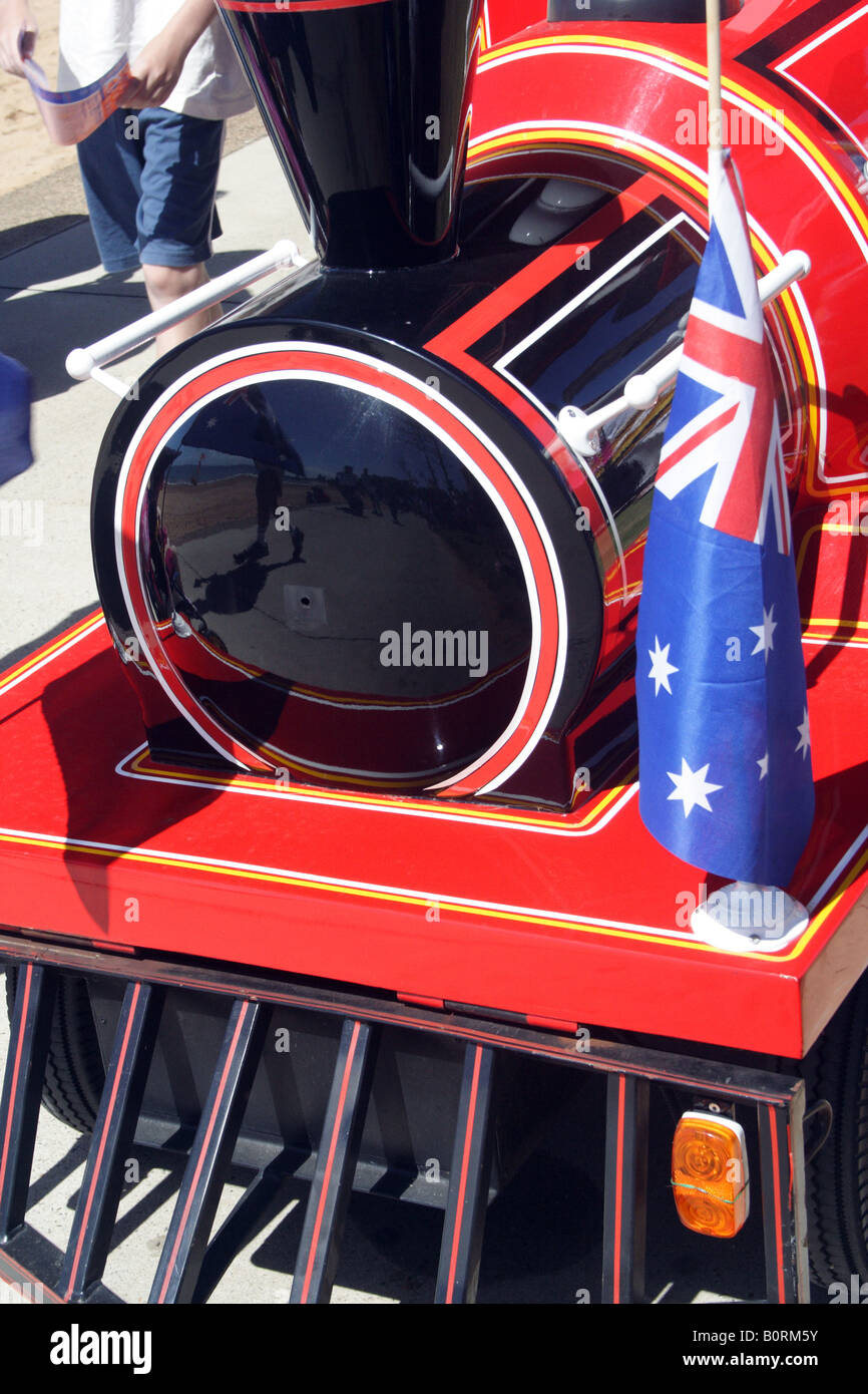 FRONT END OF A RED MODEL STEAM TRAIN WITH AUSTRALIAN FLAG VERTICAL ...