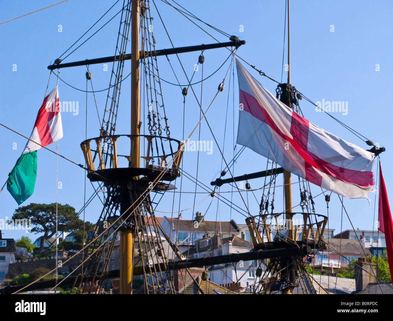 Flags and rigging on the golden hind Devon UK Stock Photo - Alamy