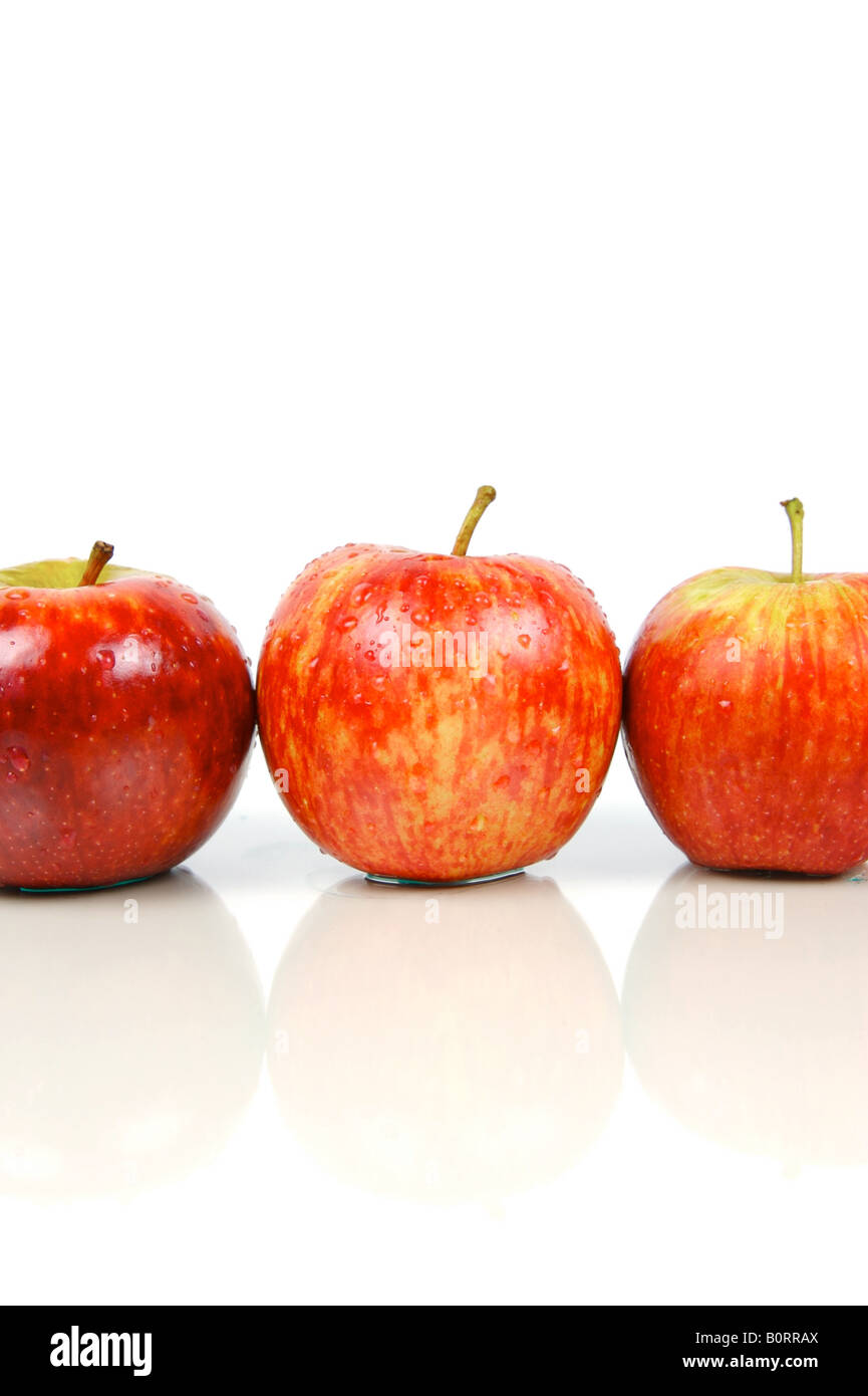 Red apples isolated against a white background Stock Photo - Alamy