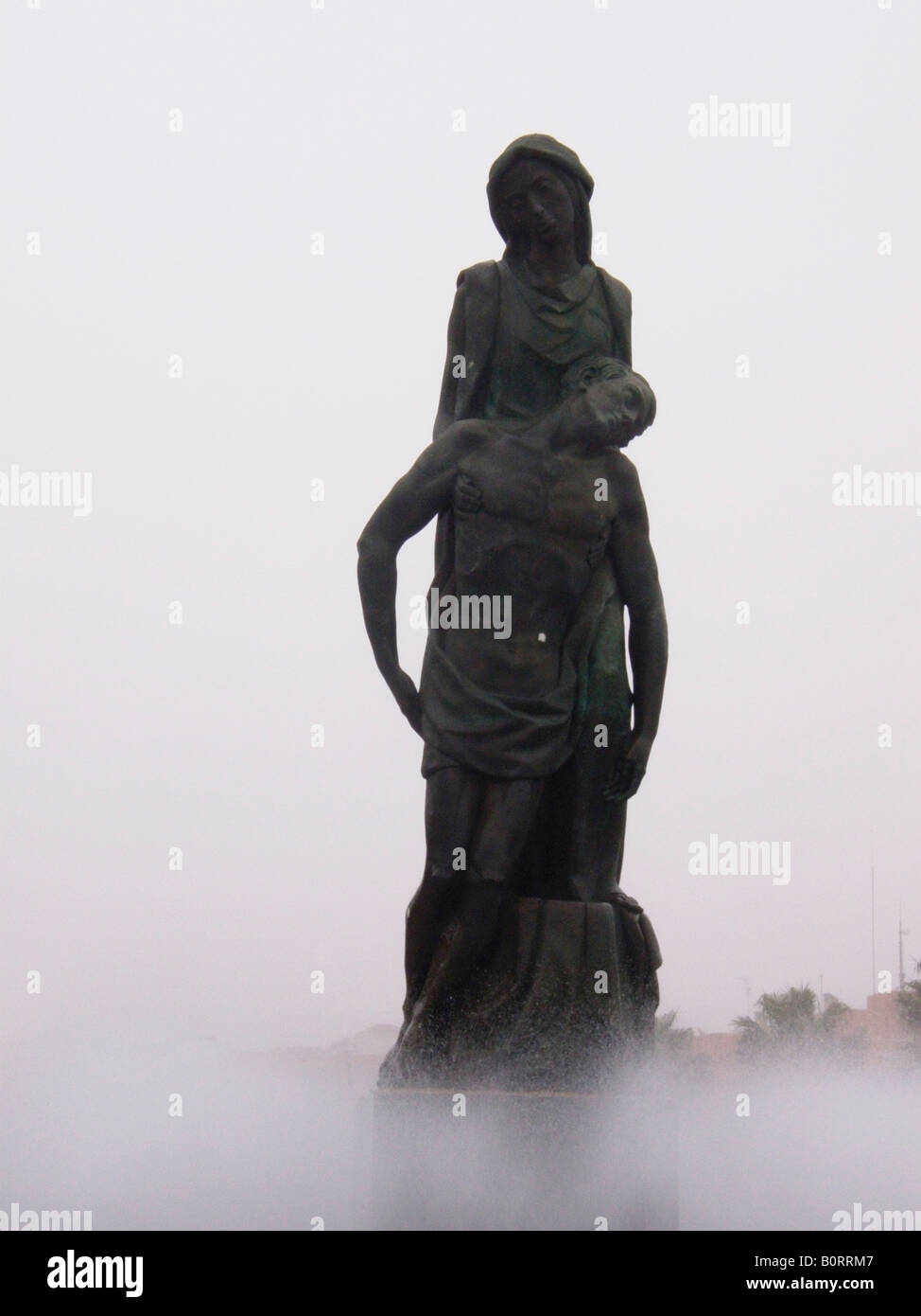 Wounded man sculpture Stock Photo - Alamy