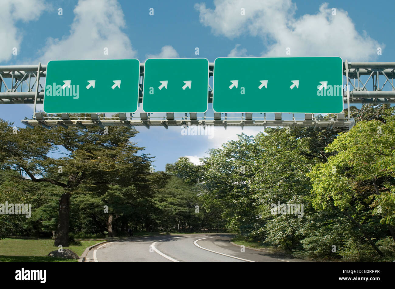 multiple highway signs pointing in same direction Stock Photo - Alamy
