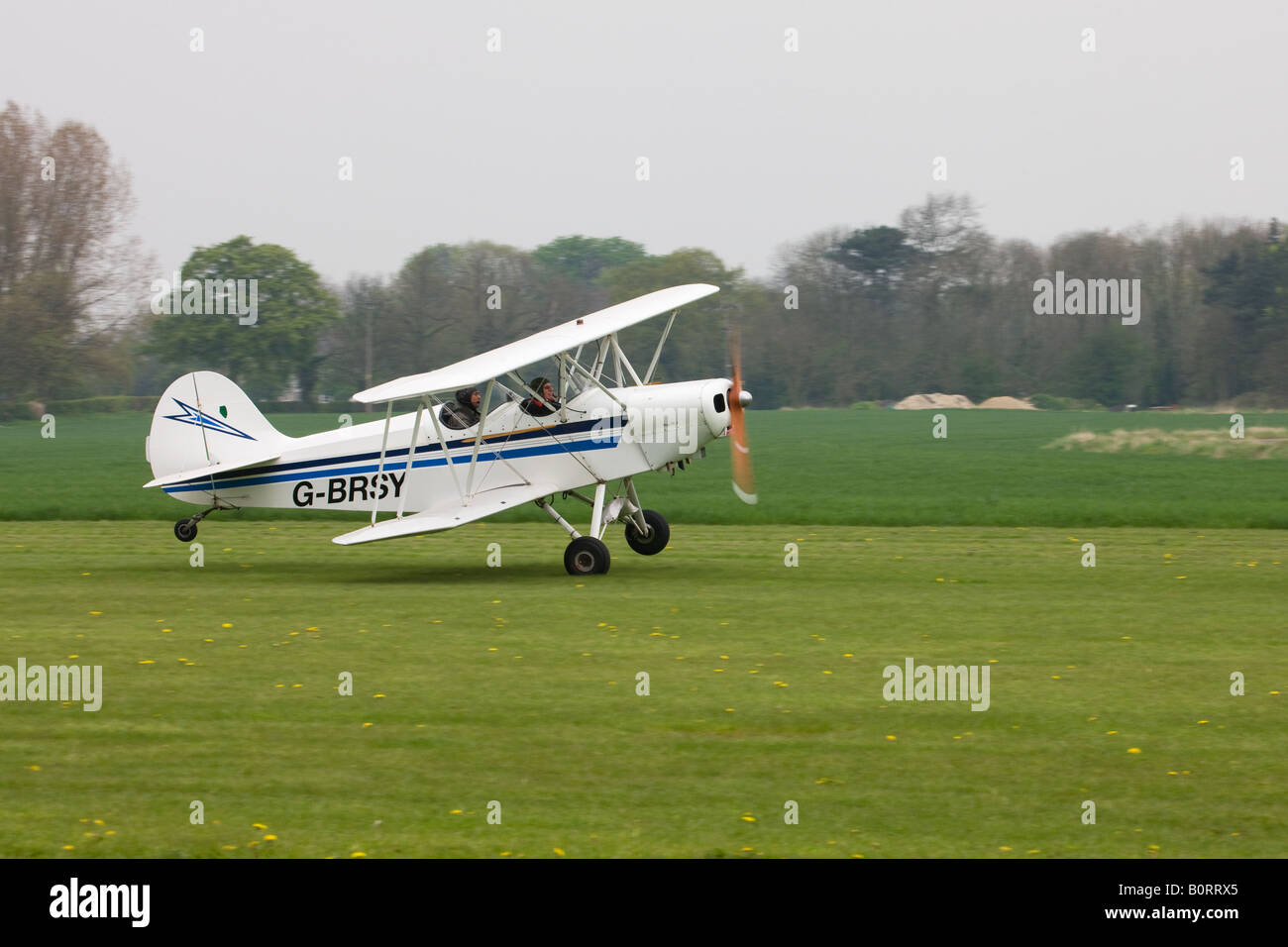 Hatz CB-1 biplane G-DRSY taking-off from Breighton Airfield Stock Photo ...