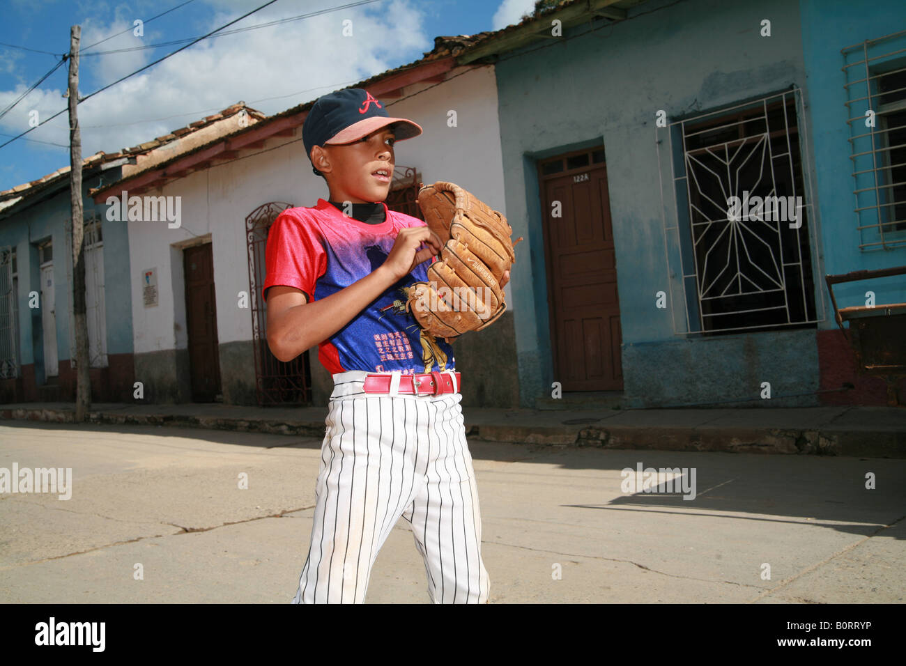 Cuban boy playing baseball in hi-res stock photography and images - Alamy