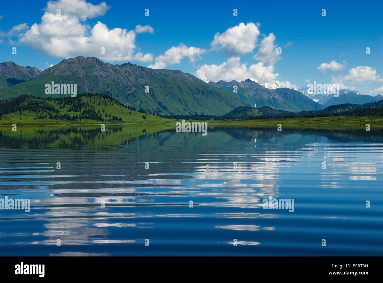 Reflection on wave in lake Stock Photo - Alamy