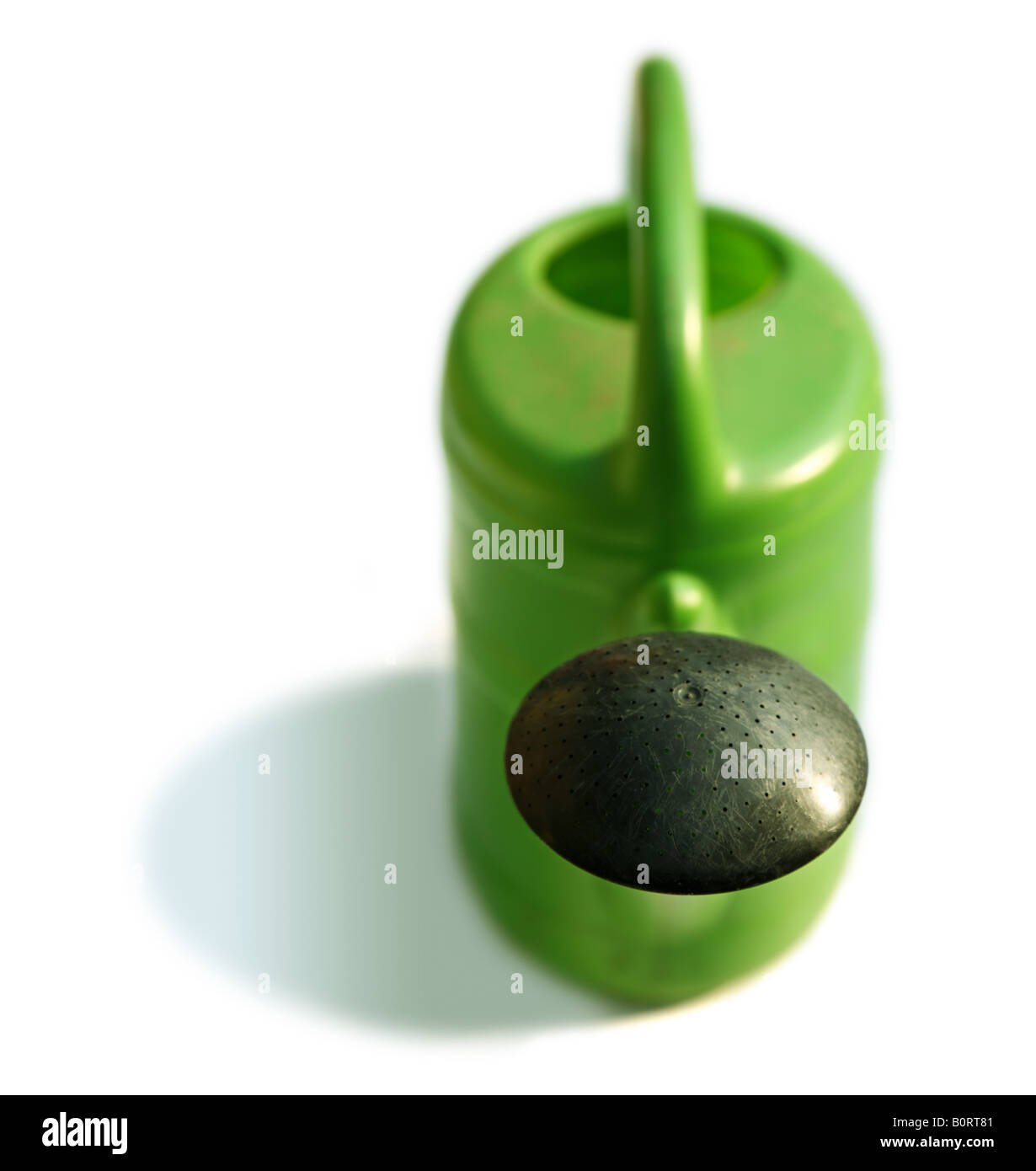 Watering can white background Stock Photo - Alamy
