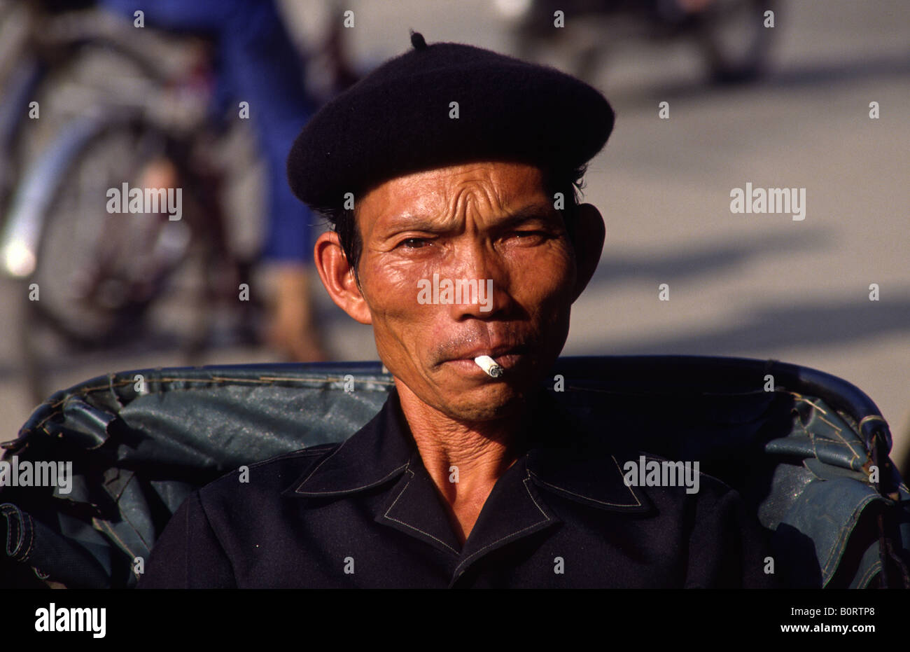 Cyclo driver. Hué. Vietnam Stock Photo - Alamy
