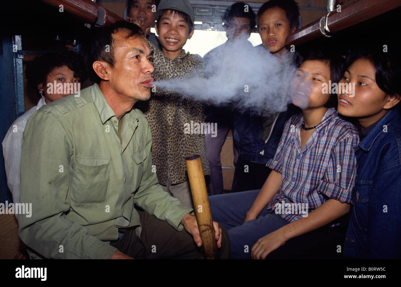 Vietnamese man smoking tobacco pipe hi-res stock photography and images ...