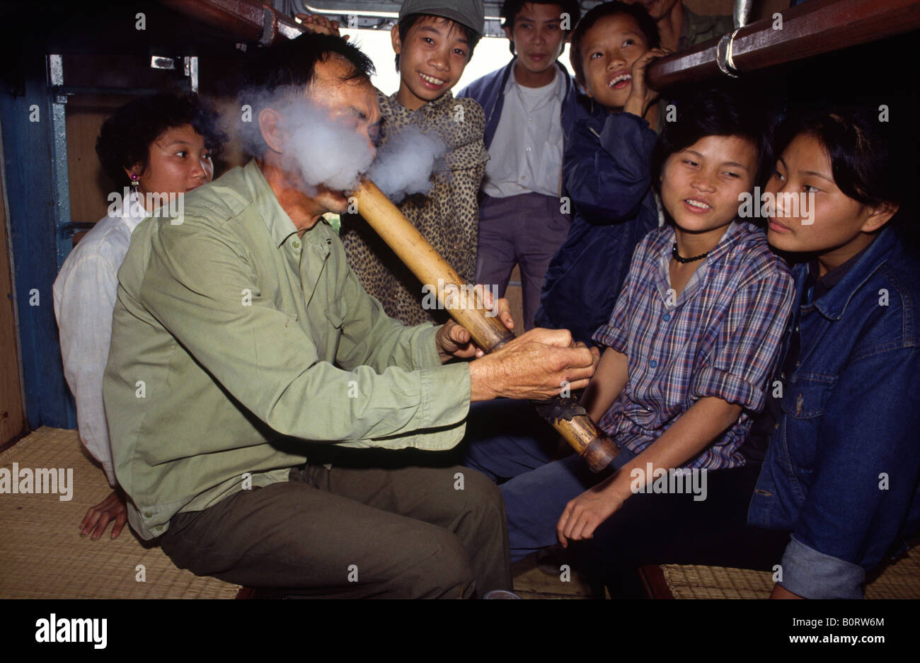 Man smoking a Bong on the train. Vietnam Stock Photo - Alamy